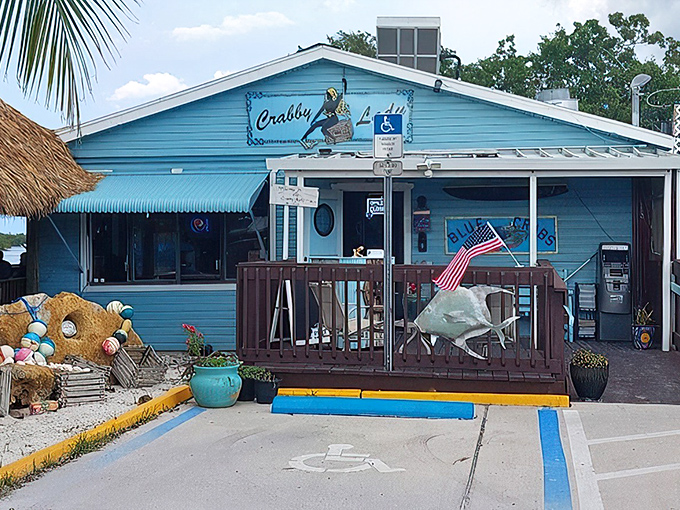 Another angle of seafood paradise! The American flag waves proudly outside this unassuming treasure, where fishing tales are as plentiful as the grouper.