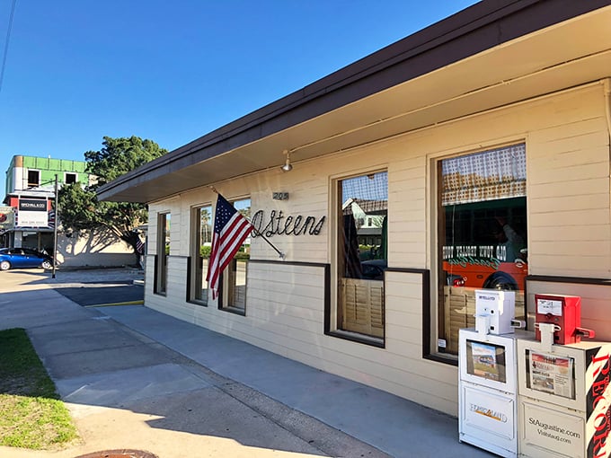 The unassuming exterior of O'Steen's belies the culinary treasures within. That American flag isn't just decoration—it's a promise of classic Florida goodness.