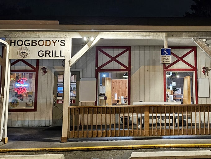 The unassuming white exterior with those iconic red doors is like Florida's version of Narnia's wardrobe – step inside for a magical culinary adventure.