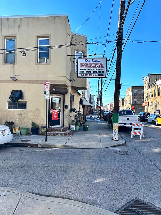 The iconic San Lucas Pizza sign beckons hungry Philadelphians like a lighthouse for the stomach-starved. Simple, straightforward, and promising delicious salvation.
