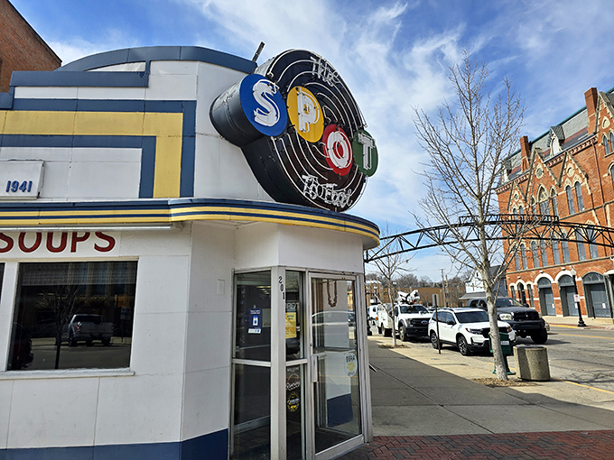 The iconic white and blue facade of The Spot has been welcoming hungry Ohioans since 1907, standing proudly on Sidney's courthouse square like a time capsule of Americana.