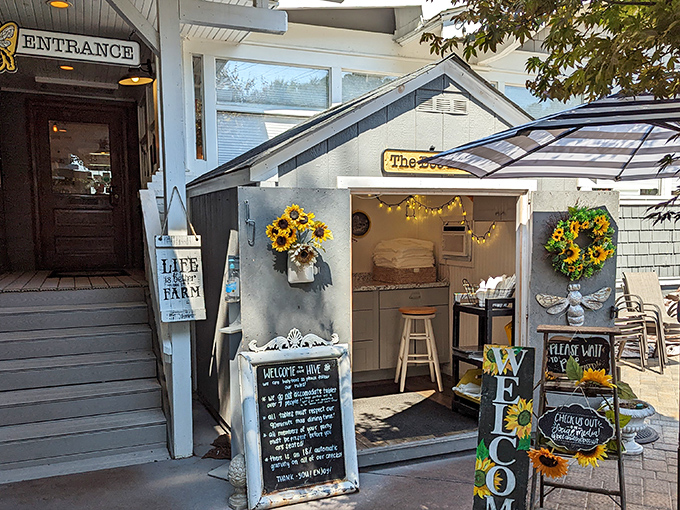 Those sunshine-yellow doors aren't just an entrance—they're a promise of the golden, buttery biscuits waiting inside this charming Pungo cottage.
