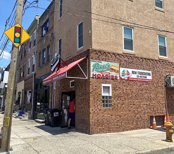 The corner brick building that houses Ricci's Hoagies stands proudly in Philadelphia, where sandwich artistry has been elevated to an art form.