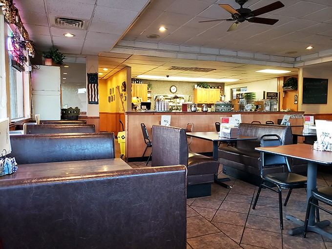 The iconic Mike's Place sign promises simple pleasures: family dining, cold beer, and free Wi-Fi – the holy trinity of roadside comfort.
