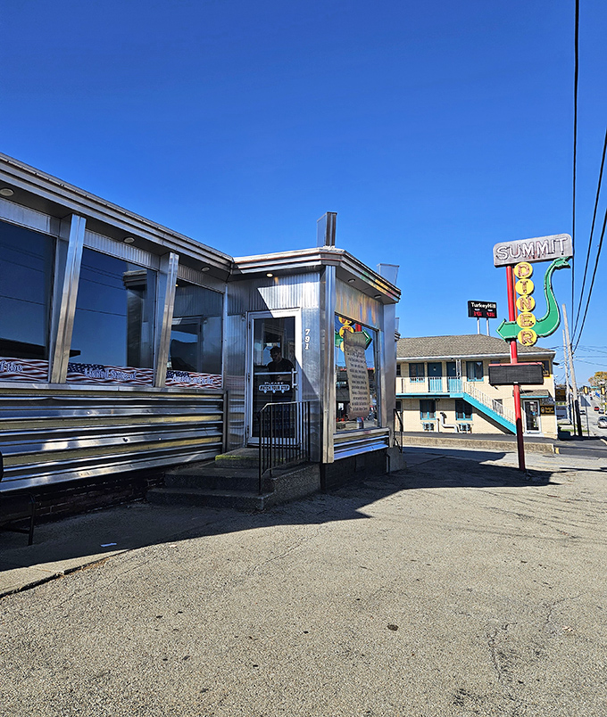 The gleaming stainless steel exterior of Summit Diner stands as a beacon of hope for hungry travelers—a chrome time machine promising delicious possibilities inside.