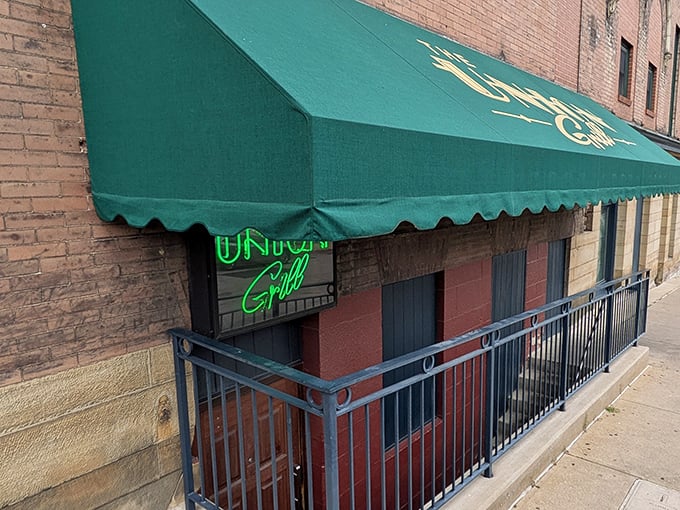 That iconic green awning and neon sign? It's like a beacon for hungry souls wandering the streets of Washington, PA. Culinary salvation awaits inside.