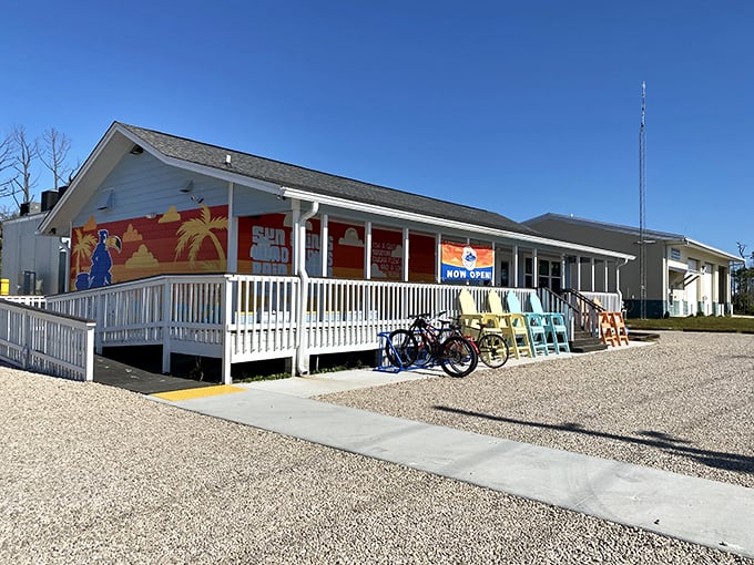 The quintessential Florida seafood shack dream – pale blue siding, white porch railings, and the promise of Gulf treasures within. Beach bikes parked outside suggest the perfect post-swim meal spot.