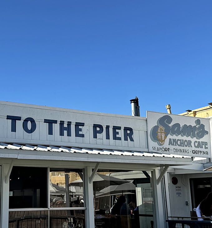 "To The Pier" isn't just a sign—it's an invitation to maritime bliss where seafood dreams come true.