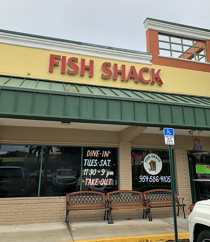 Strip mall chic meets seafood paradise – where the green awning shelters Florida's worst-kept delicious secret.