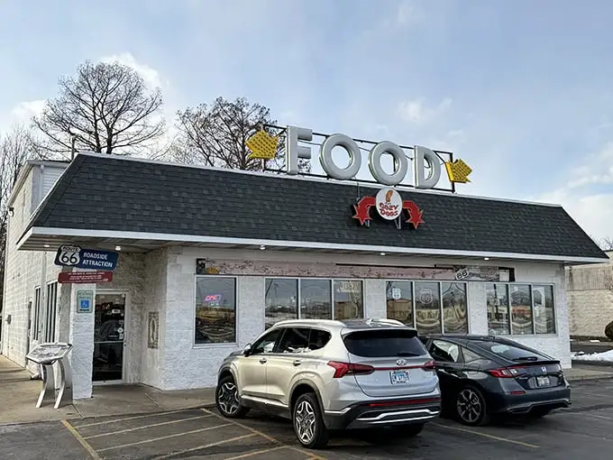 The humble roadside exterior of Cozy Dog Drive In belies its legendary status. This unassuming building on Route 66 has been making Illinois stomachs happy for generations.