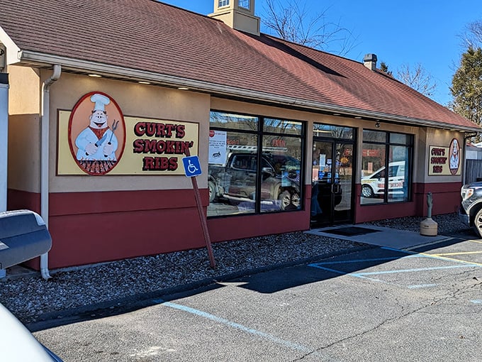 The humble exterior of Curt's Smokin' Ribs in Mill Hall belies the flavor explosion waiting inside. That cartoon pig knows what's up.
