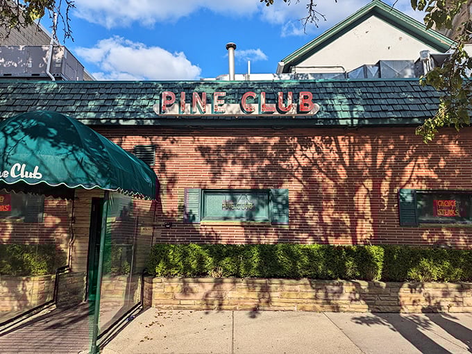 The neon glow of Pine Club's sign has been beckoning hungry Daytonians for decades, a red-lit promise of carnivorous delights within.