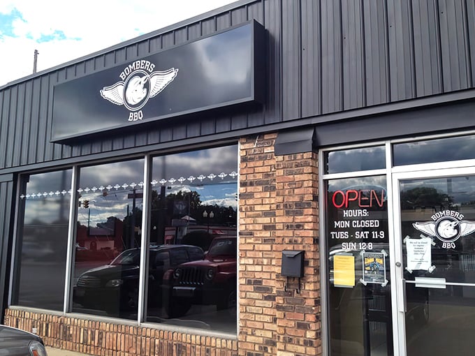 The unassuming exterior of Bombers BBQ in Munster hides a smoky paradise within. Like finding a treasure map in your attic, the real adventure begins once you step inside.