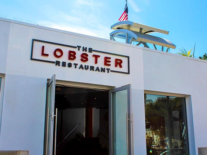 That bold red signage isn't just branding—it's a promise of the crimson crustacean delights awaiting you at this oceanfront gem.