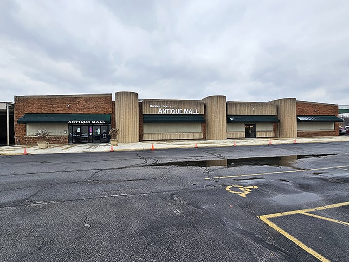 The unassuming exterior of Heritage Square Antique Mall hides a universe of treasures within, like a time-travel portal disguised as a strip mall storefront.