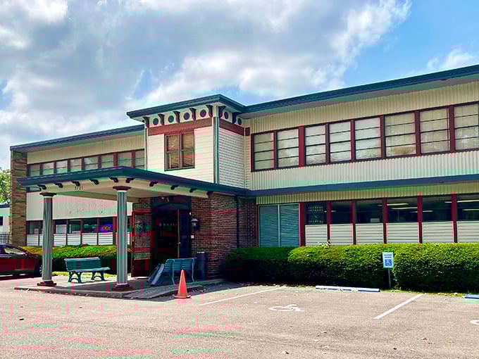 The Grand Antique Mall's distinctive mid-century architecture stands like a sentinel guarding treasures from bygone eras. That teal trim isn't just decorative—it's a portal warning.