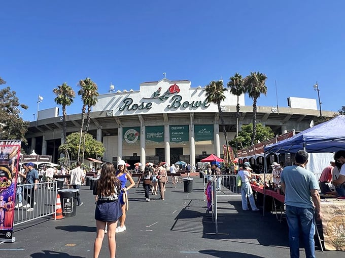 The iconic Rose Bowl entrance transforms monthly from football shrine to treasure hunter's paradise, where early birds catch the mid-century modern worm.