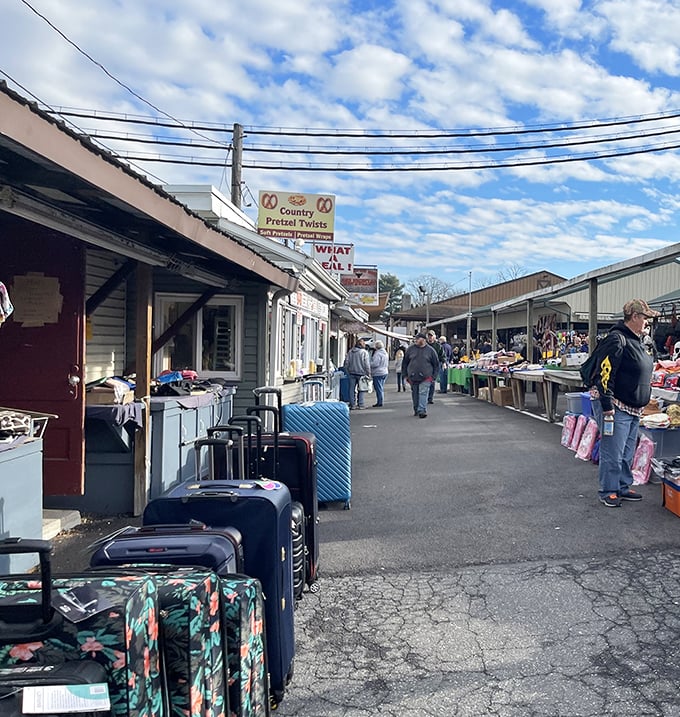 The outdoor vendor alley at Green Dragon Market – where treasure hunting begins and wallets breathe their last sigh of contentment.