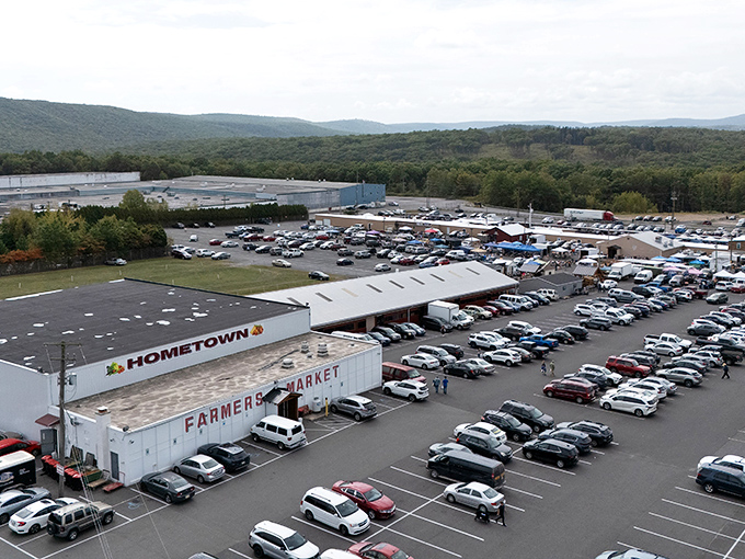 From this aerial view, Hometown Farmers Market looks deceptively calm—like the opening scene before the treasure-hunting adventure begins.