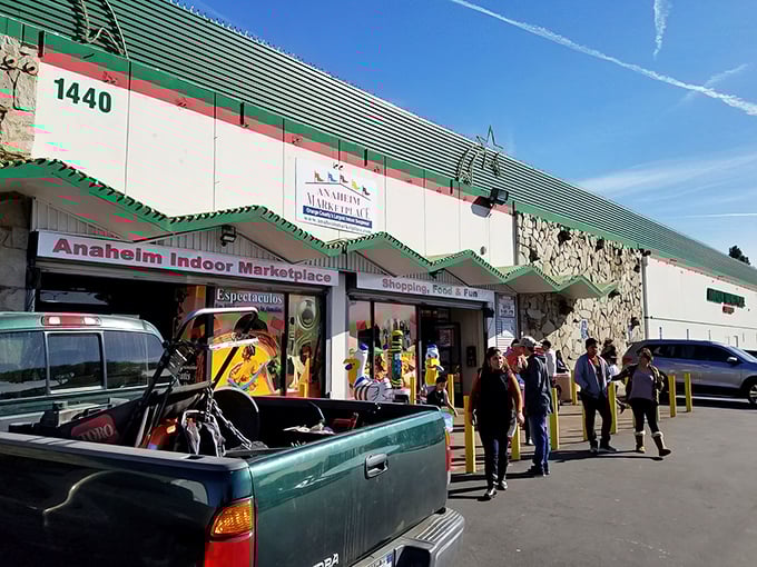 The iconic exterior of Anaheim Marketplace welcomes shoppers with its distinctive green and red trim—a hint at the cultural fusion waiting inside.