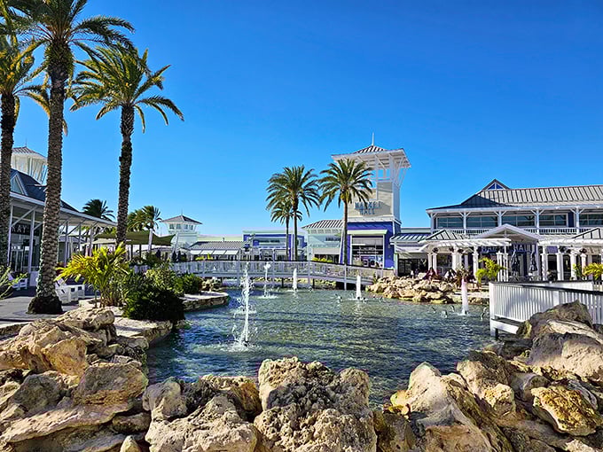 Paradise isn't always a beach—sometimes it's a pristine shopping center with palm trees, water features, and discounts that'll make your wallet smile.
