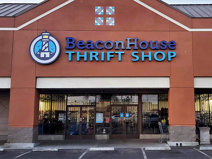 The terracotta-colored façade with its cheerful lighthouse logo promises treasure hunting adventures within. No fancy designer boutique prices here—just honest-to-goodness bargains.