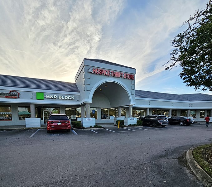 The grand entrance beckons bargain hunters with its distinctive archway and bright signage—Florida thrift shopping at its most inviting.