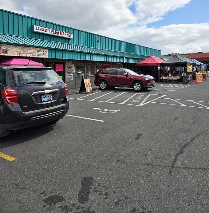 The distinctive teal exterior of Lancaster Flea Market beckons treasure hunters like a retail oasis in Salem's urban landscape.