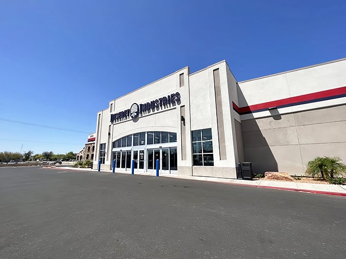 The gleaming white facade of Deseret Industries stands like a temple to thrift shopping, promising air-conditioned treasure hunting under the relentless Arizona sun.