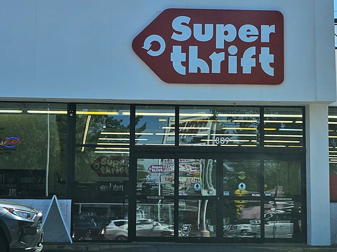 The iconic red arrow sign beckons thrift enthusiasts like a retail lighthouse guiding ships to treasure-filled shores.