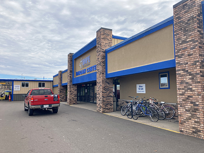 The bright blue facade of Hope Gospel Mission Bargain Center stands like a beacon for bargain hunters—Wisconsin's thrift paradise awaits behind those doors.