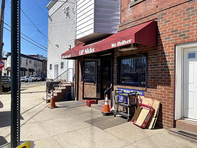 "We Deliver" promises the awning, but trust me—this is a sandwich pilgrimage worth making in person.
