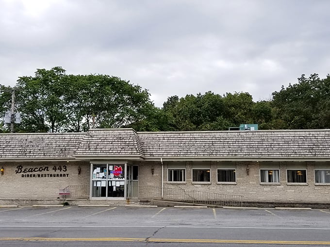 The classic roadside sign beckons like an old friend – Beacon 443's weathered charm promising comfort food salvation for hungry Pennsylvania travelers.
