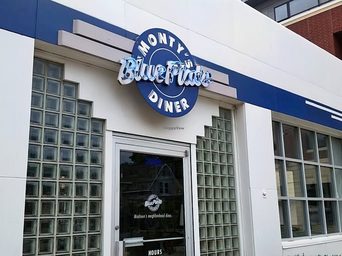 The blue and white Art Deco facade isn't just eye-catching—it's a beacon for hungry souls seeking comfort food nirvana in Madison's east side.