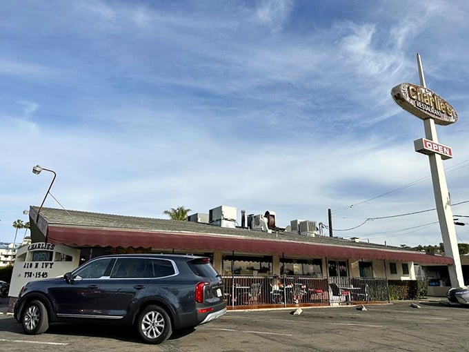 The classic California diner experience awaits under that unmistakable vintage sign. Some architectural trends come and go, but comfort food is eternal.