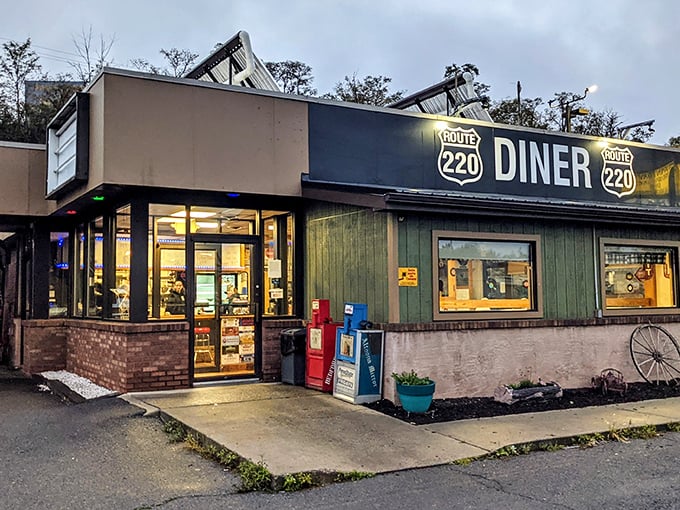 The twilight glow makes Route 220 Diner look like Edward Hopper's "Nighthawks" reimagined in Bedford—a beacon for hungry travelers on Pennsylvania's highways.