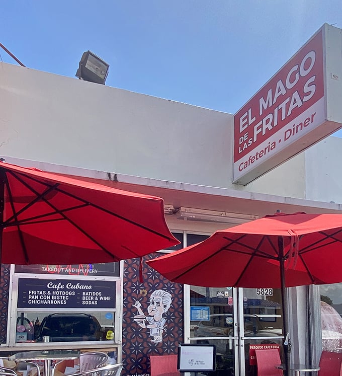 The unassuming storefront with its bright red umbrellas promises culinary magic that lives up to the name—"The Magician of Fritas" indeed!