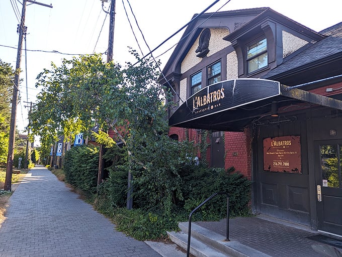The restaurant occupies a former carriage house, its unassuming entrance belying the culinary treasures that await inside.