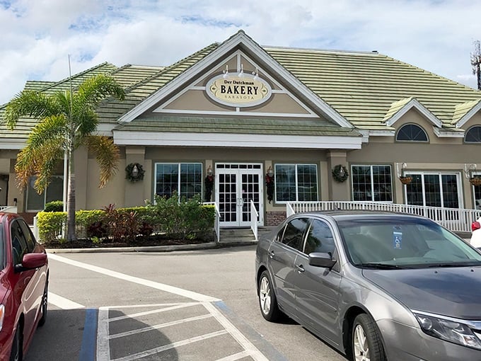 The distinctive green-roofed Der Dutchman stands like an oasis of comfort food amid the Florida palms, promising Amish delights inside those welcoming doors.