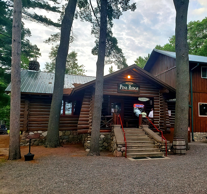 Nestled among towering pines, this authentic log cabin restaurant isn't trying to impress anyone—until you taste what's cooking inside.