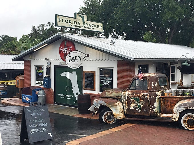Where rustic meets rusty—this weathered pickup truck outside the Trading Company entrance is Florida authenticity at its finest.
