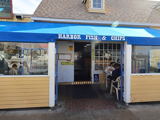 The blue awning beckons like a maritime flag signaling delicious treasures within. This unassuming storefront houses some of Oceanside's finest seafood creations.