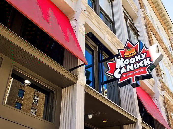 The iconic maple leaf sign beckons hungry travelers like a Canadian lighthouse guiding ships to caloric salvation.