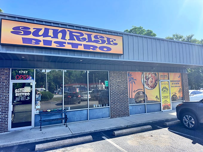 The bright yellow sign of Sunrise Bistro beckons like a culinary lighthouse on Johns Island, promising breakfast treasures for those wise enough to stop.