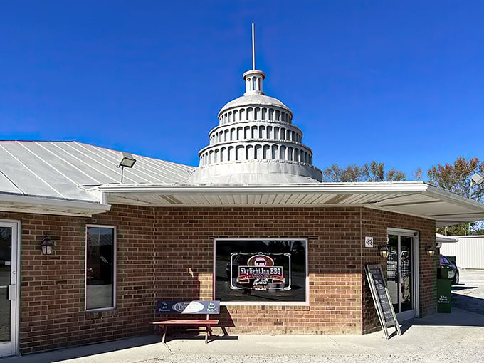 That silver dome isn't compensating for anything—it's announcing to the world that barbecue royalty resides in this humble brick building in Ayden.