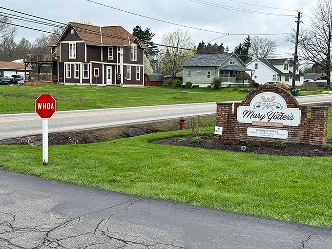 The "WHOA" sign at Mary Yoder's entrance isn't just cute – it's a warning your diet is about to surrender.