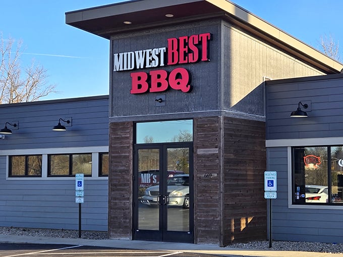 The unassuming exterior of Midwest Best BBQ & Creamery stands like a smoke signal to hungry travelers – barbecue nirvana awaits inside those doors.