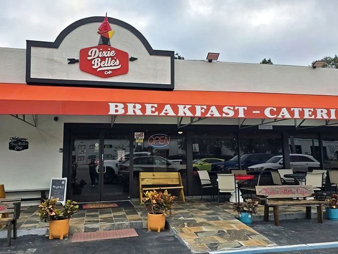 That bright orange awning isn't just for show—it's nature's way of saying "Breakfast served here. Life-changing pancakes inside."