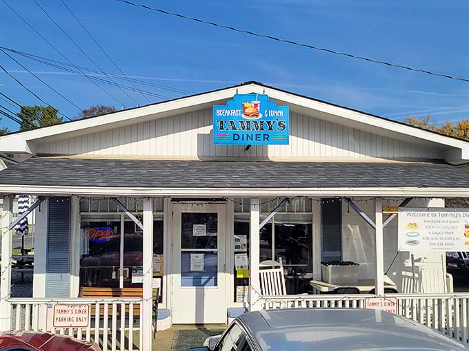 That iconic blue sign says it all—breakfast and lunch served with small-town charm. The rocking chairs on the porch practically whisper "stay awhile."