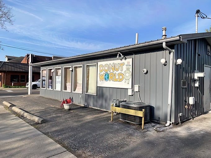 This unassuming gray building holds treasures that would make Willy Wonka jealous – if he'd gone into donuts instead.